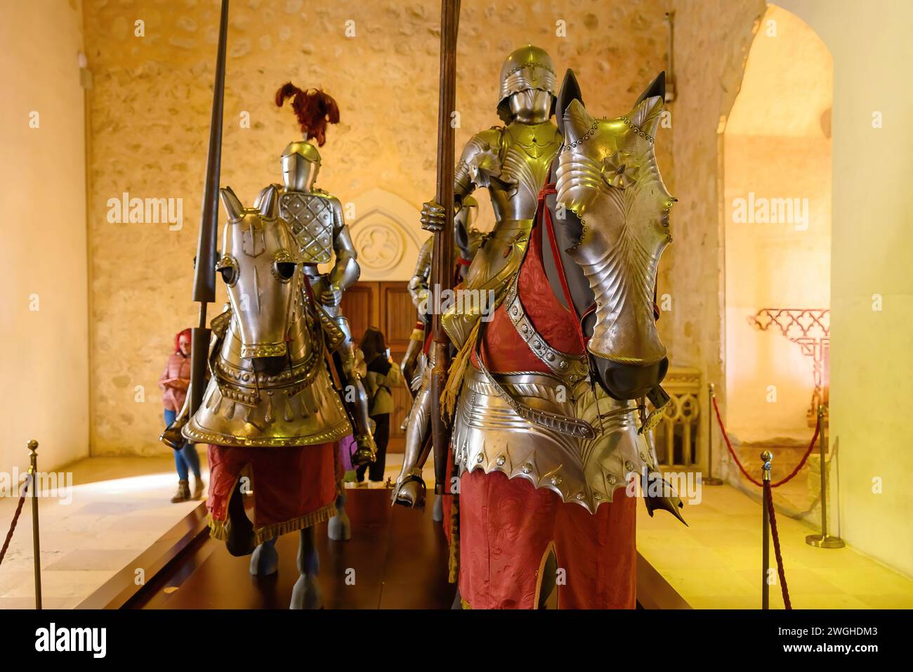 Knights with armor riding horses in Alcazar de Segovia, Spain Stock ...