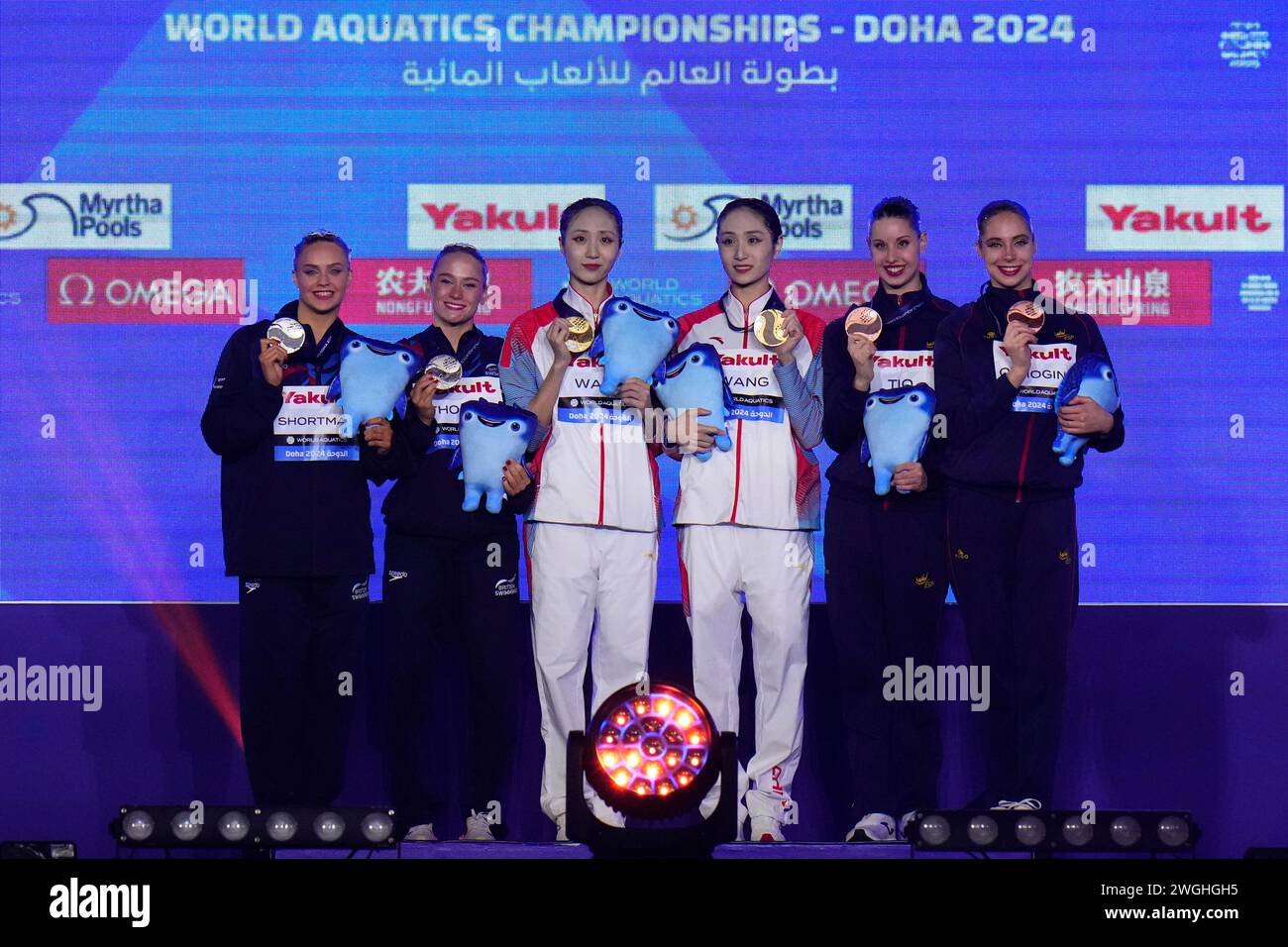 Silvers medalists Kate Shortman and Isabelle Thorpe, of Great Britain, gold medalists Wang Liuyi ...