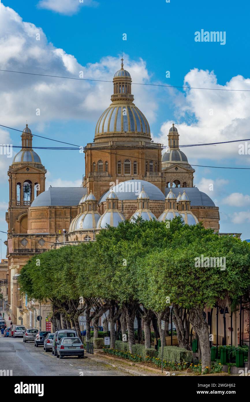 Paola, Malta - October 20th 2019: The tree lined road leading to the ...