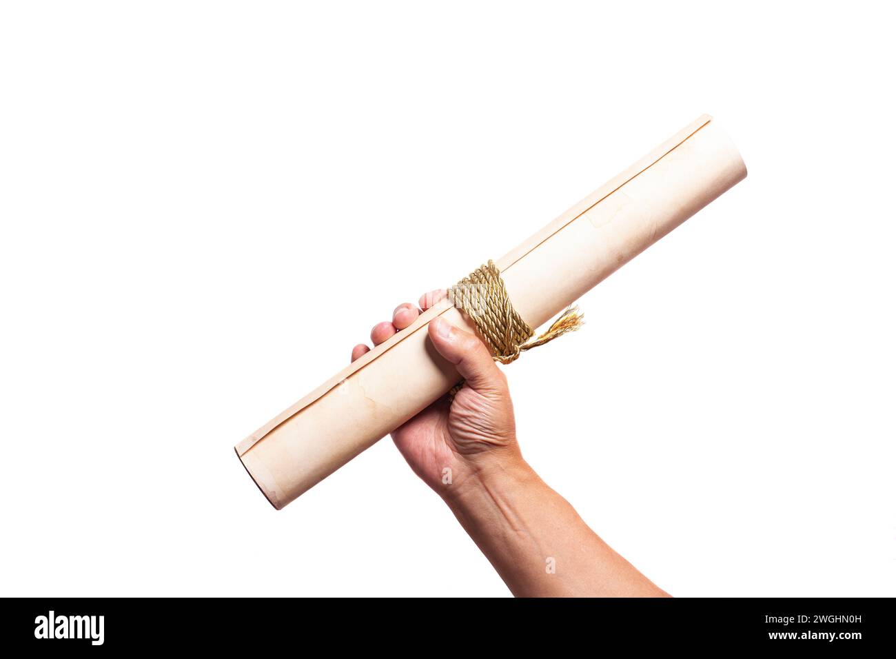 scroll of antique paper tied with a golden rope in hand Stock Photo - Alamy