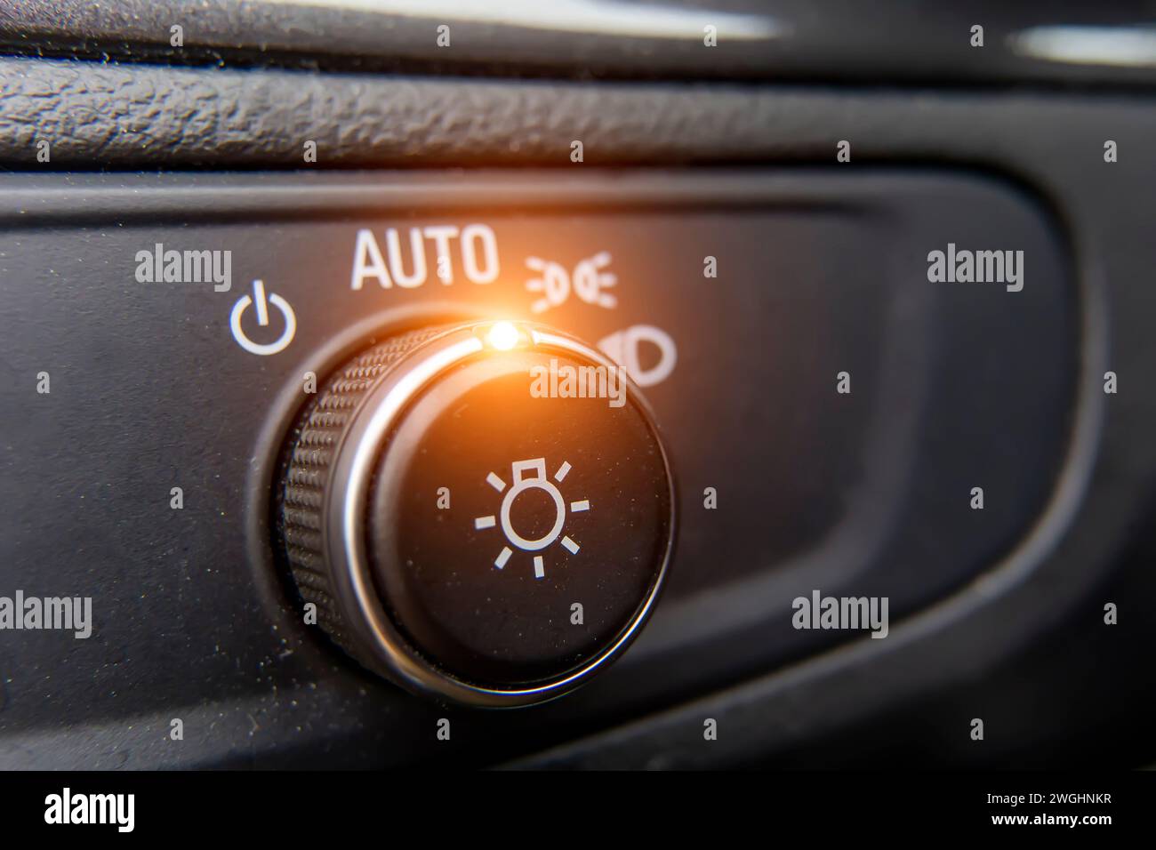 the button to turn on the automatic lighting Stock Photo - Alamy