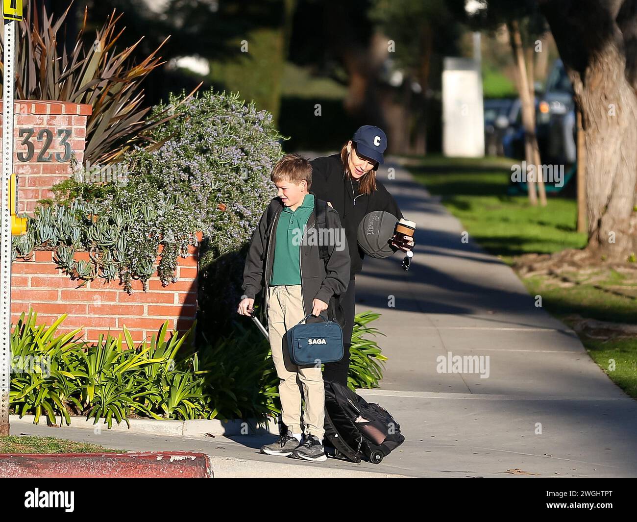 Jennifer Garner picks up son Samuel Affleck from school. Featuring ...