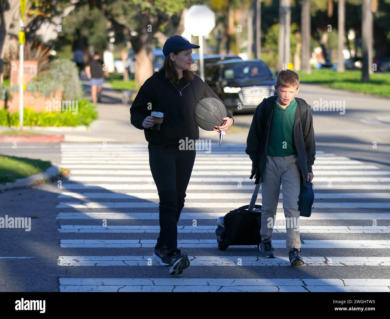 Jennifer Garner picks up son Samuel Affleck from school. Featuring ...
