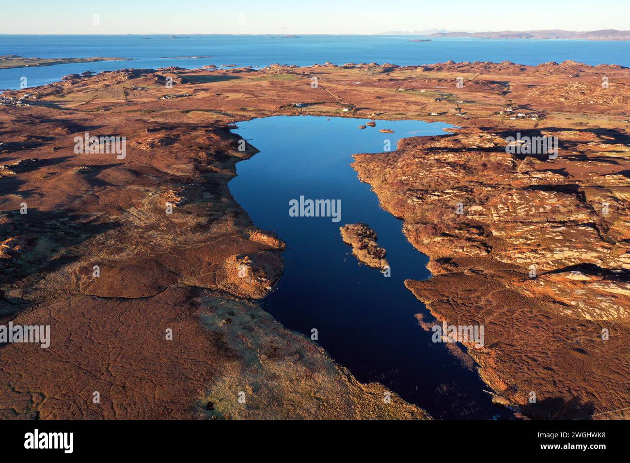 Loch Pottie, a freshwater loch on the Ross of Mull a sparsely populated ...