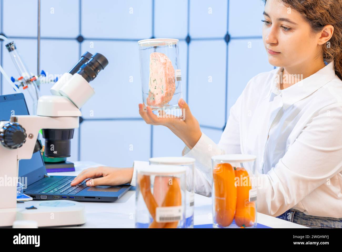 young woman in food quality control laboratory Stock Photo - Alamy
