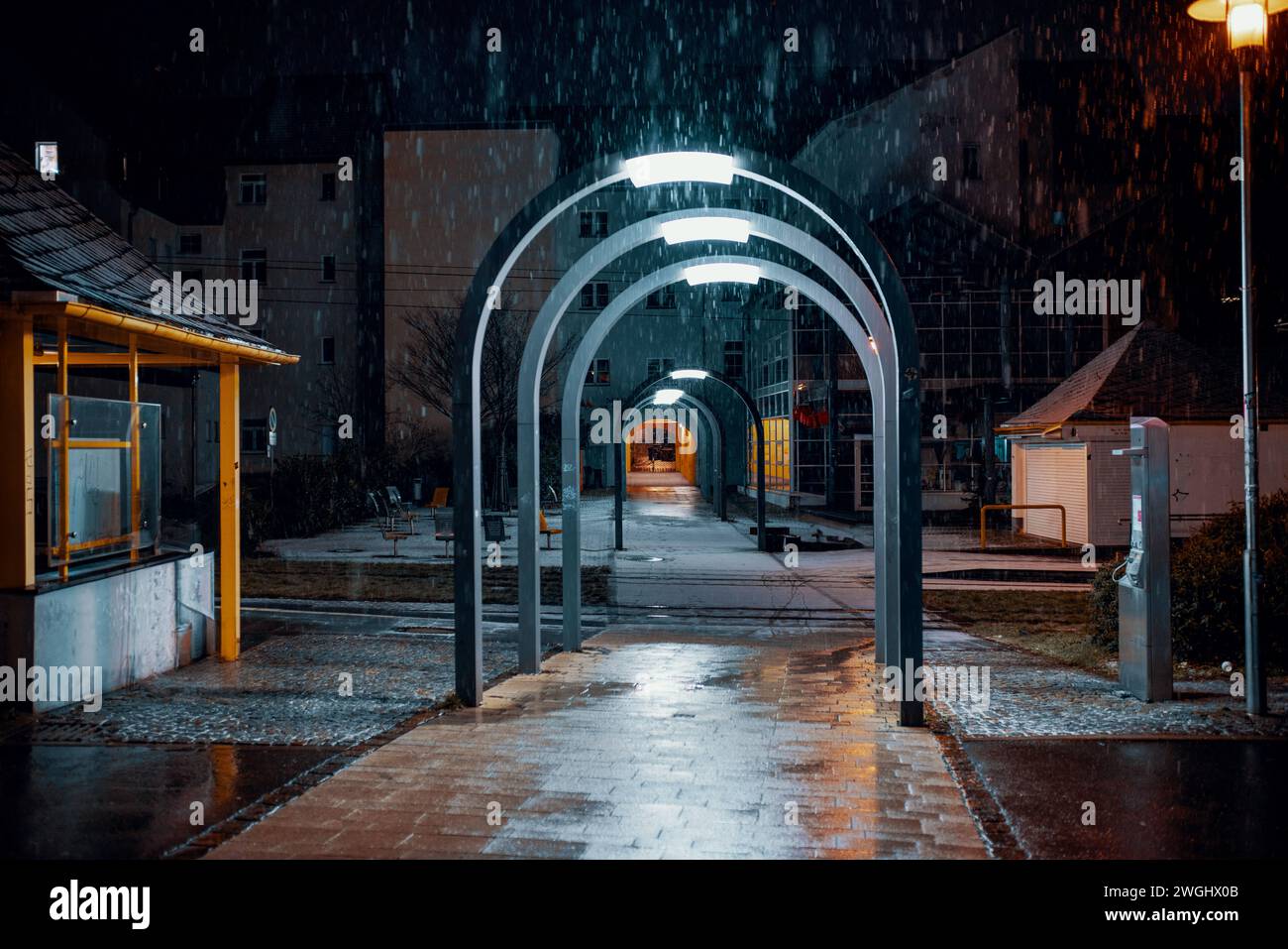 arches in the night city during the rain Stock Photo - Alamy