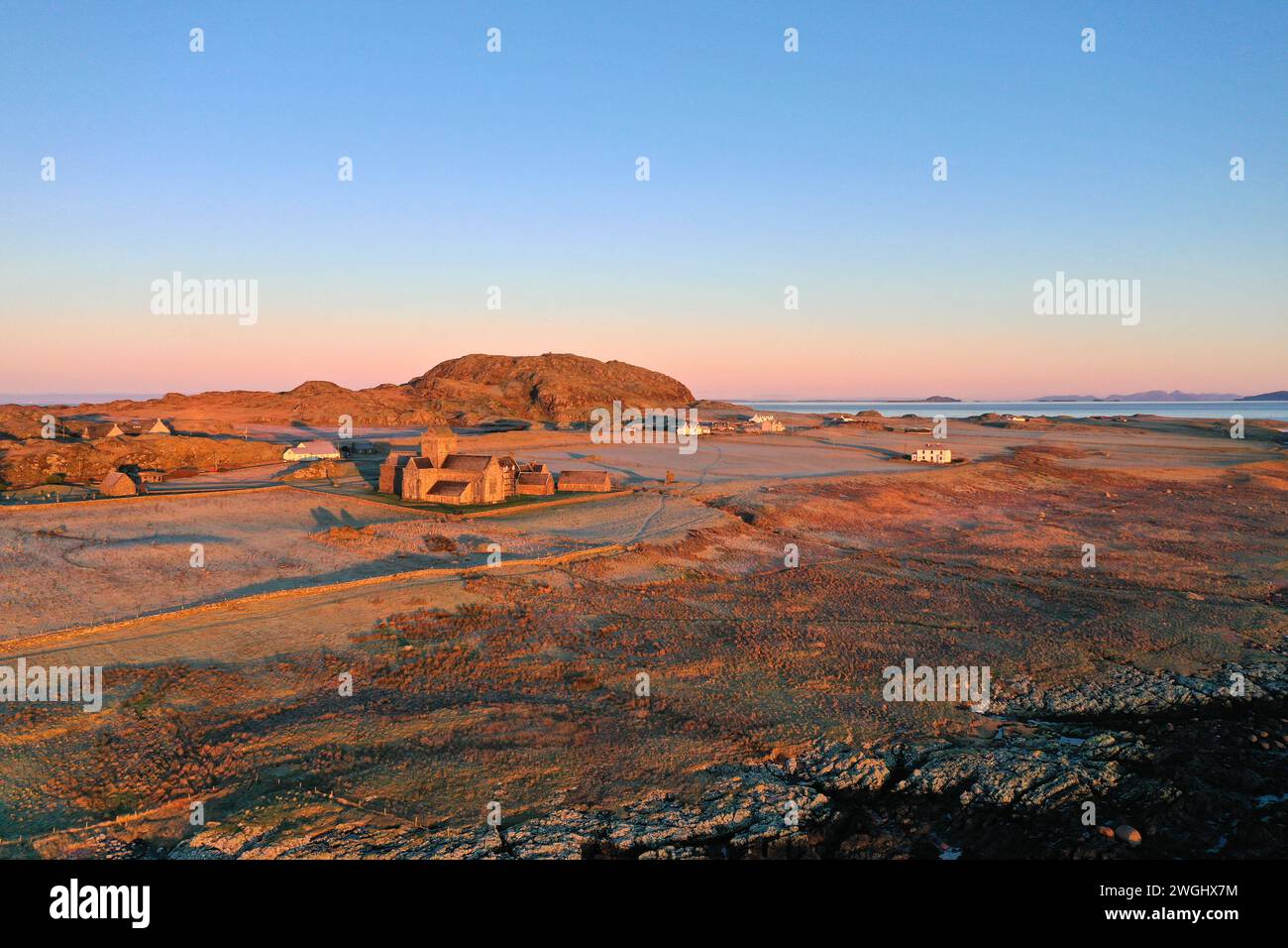 Aerial view on a cold frosty and sunny winters morning over Iona Abbey ...