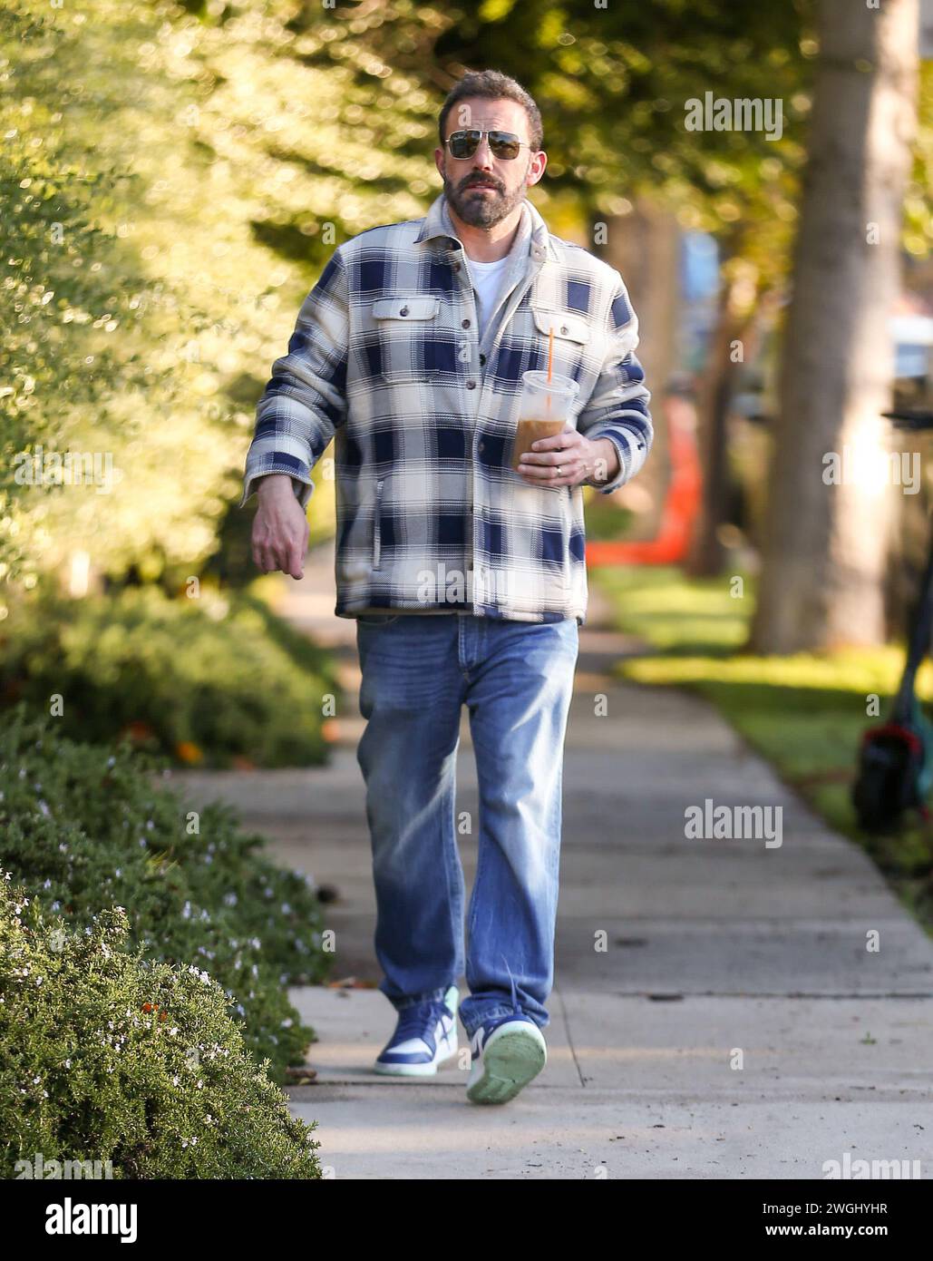Ben Affleck is seen with his iced coffee drink while dropping off son ...