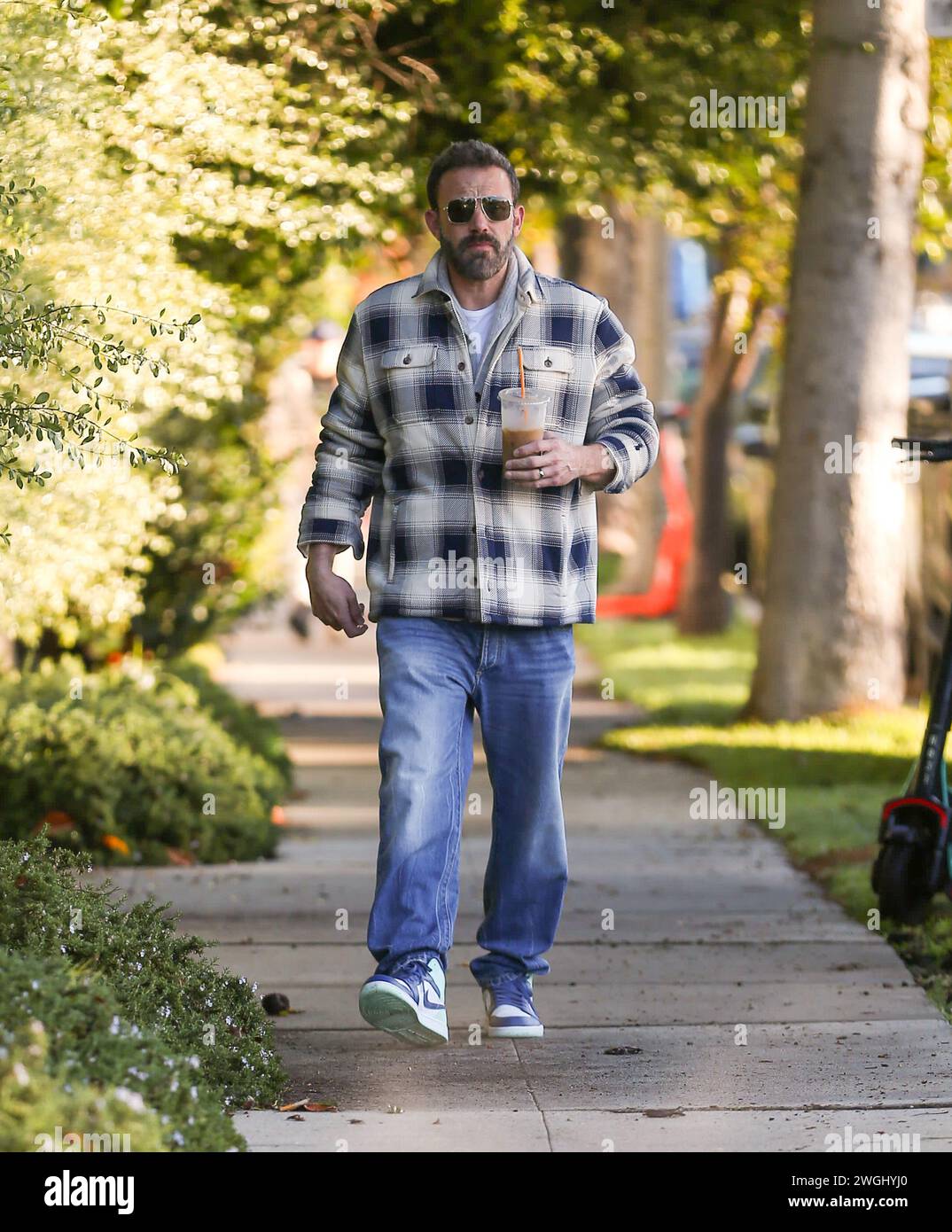 Ben Affleck is seen with his iced coffee drink while dropping off son ...