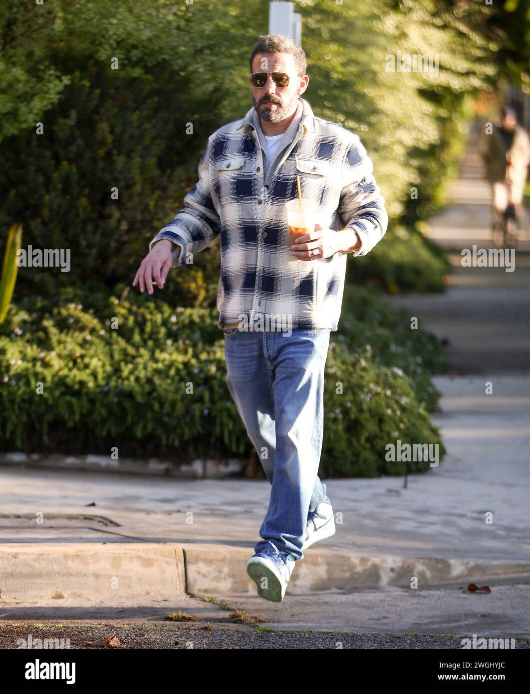 Ben Affleck is seen with his iced coffee drink while dropping off son ...