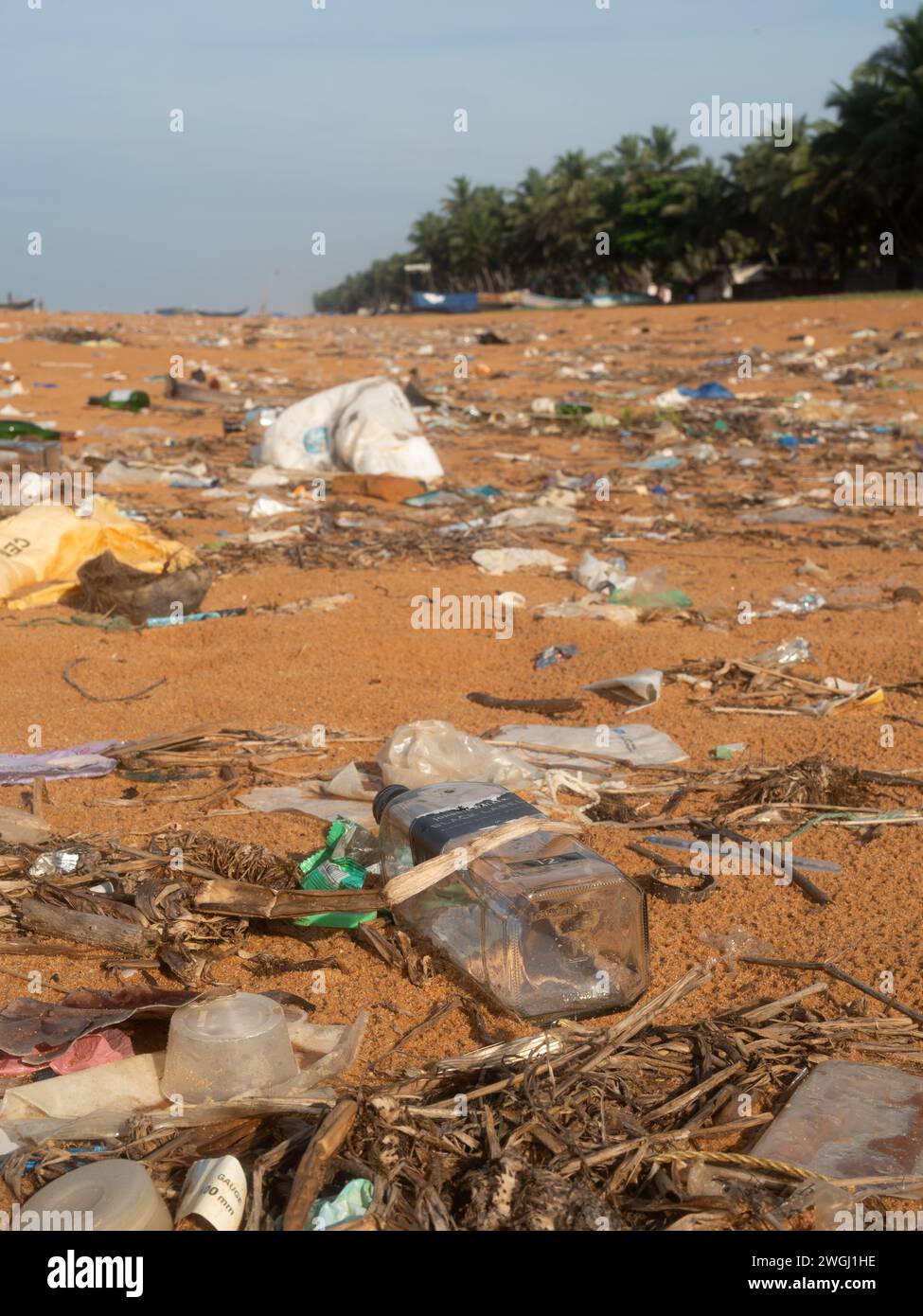 Trash on the beach. Eco issues in the world Stock Photo - Alamy