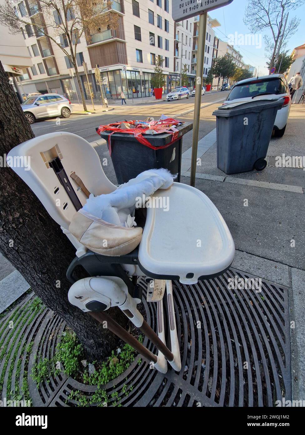 Bulky objects and badly sorted garbages in a can, street view, Bron ...