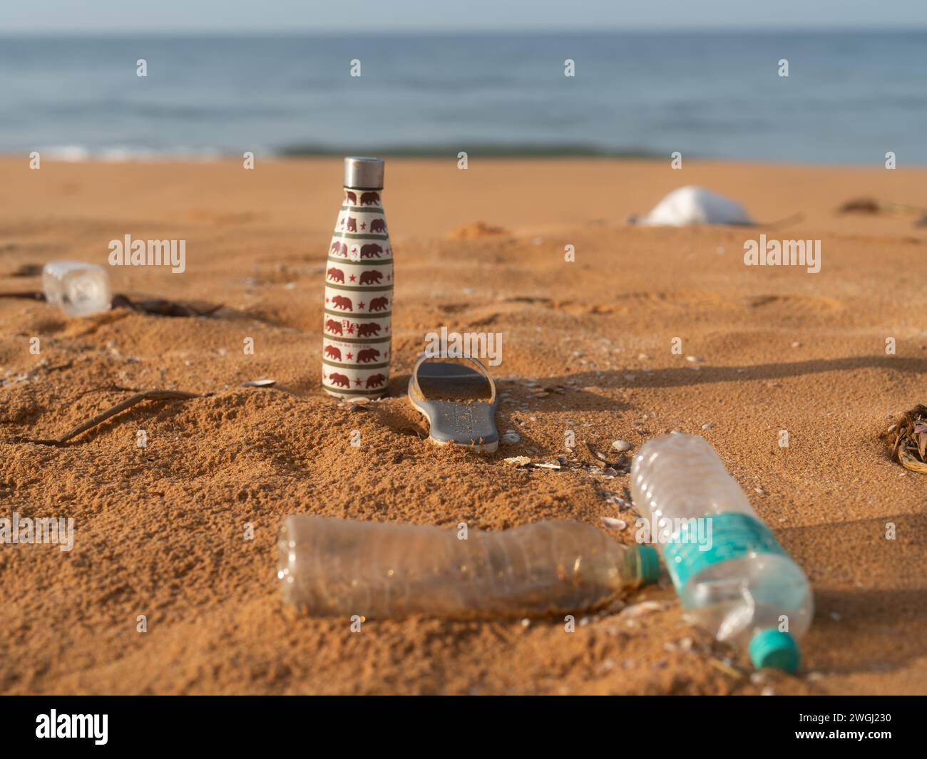 Trash on the beach. Eco issues in the world Stock Photo - Alamy