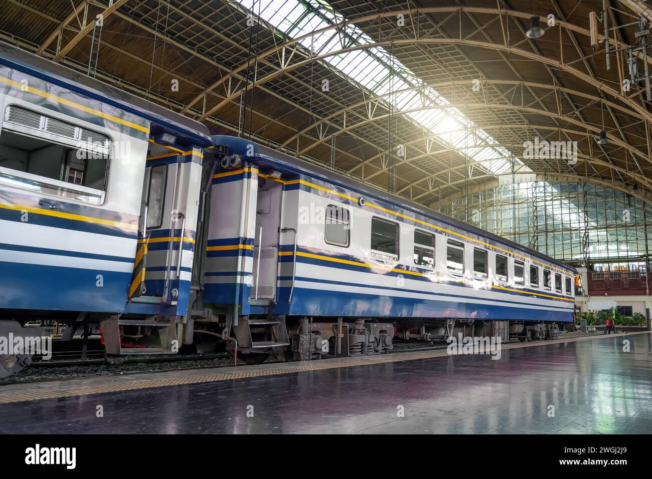 Railway train passenger carriages, inside the arch there is an ancient ...