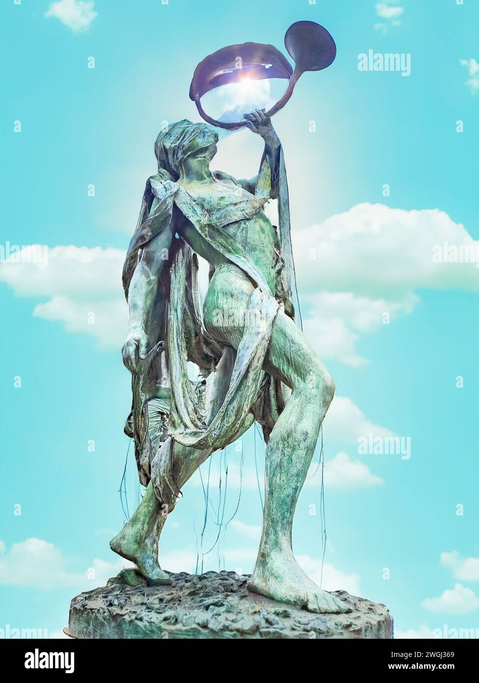 Bronze statue of musician. Bugler and trumpeter plays the hunting horn ...