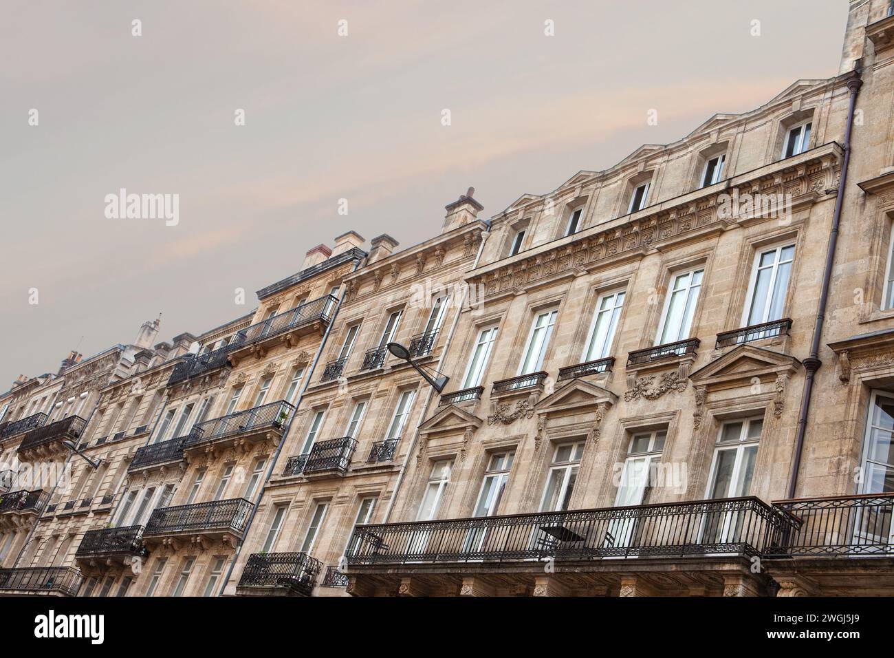 Facades of stone buildings in Bordeaux France Stock Photo - Alamy