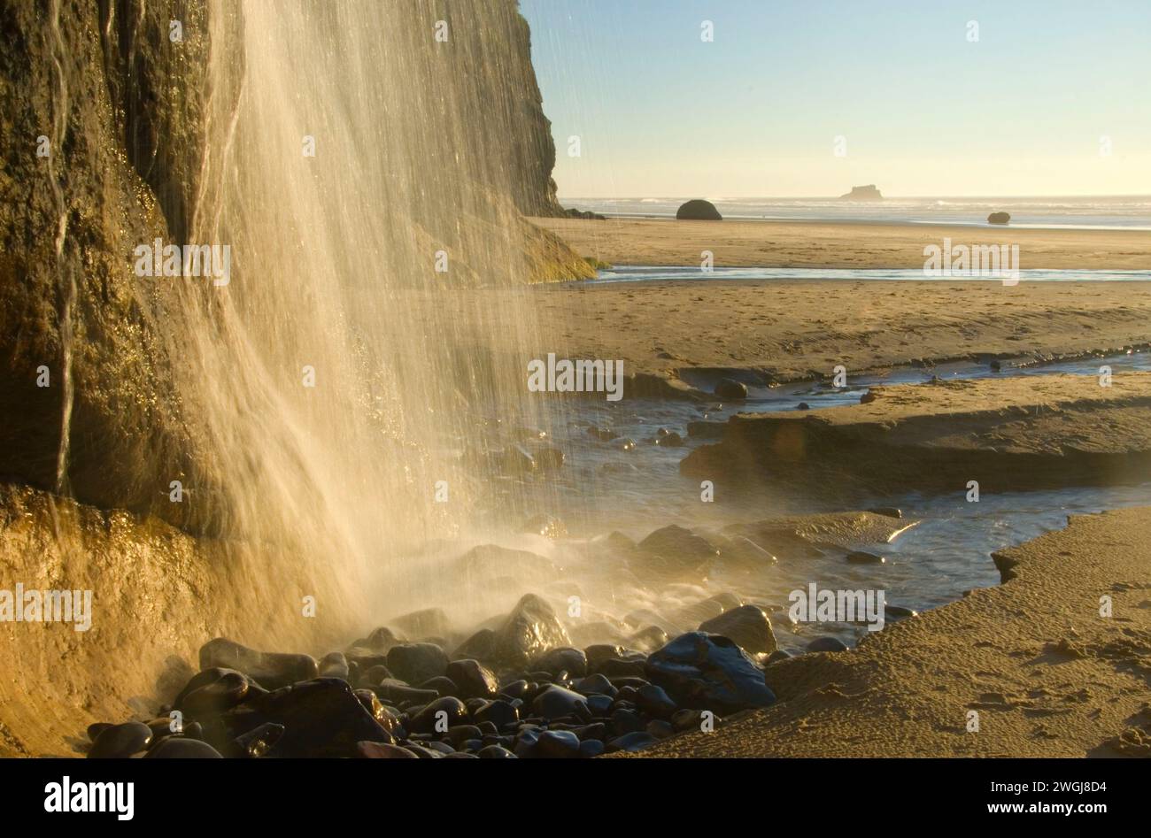 Beach waterfall, Hug Point State Park, Oregon Stock Photo - Alamy