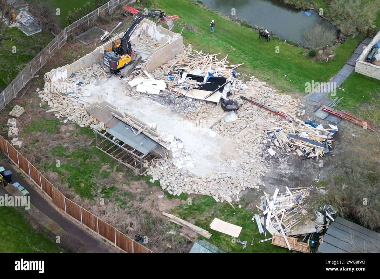 Work continues to demolish an unauthorised spa pool block at the home ...