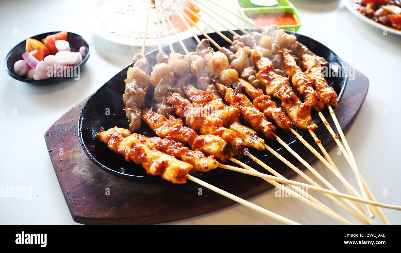 Delicious culinary Indonesian Food, chicken satay and goat satay in the ...