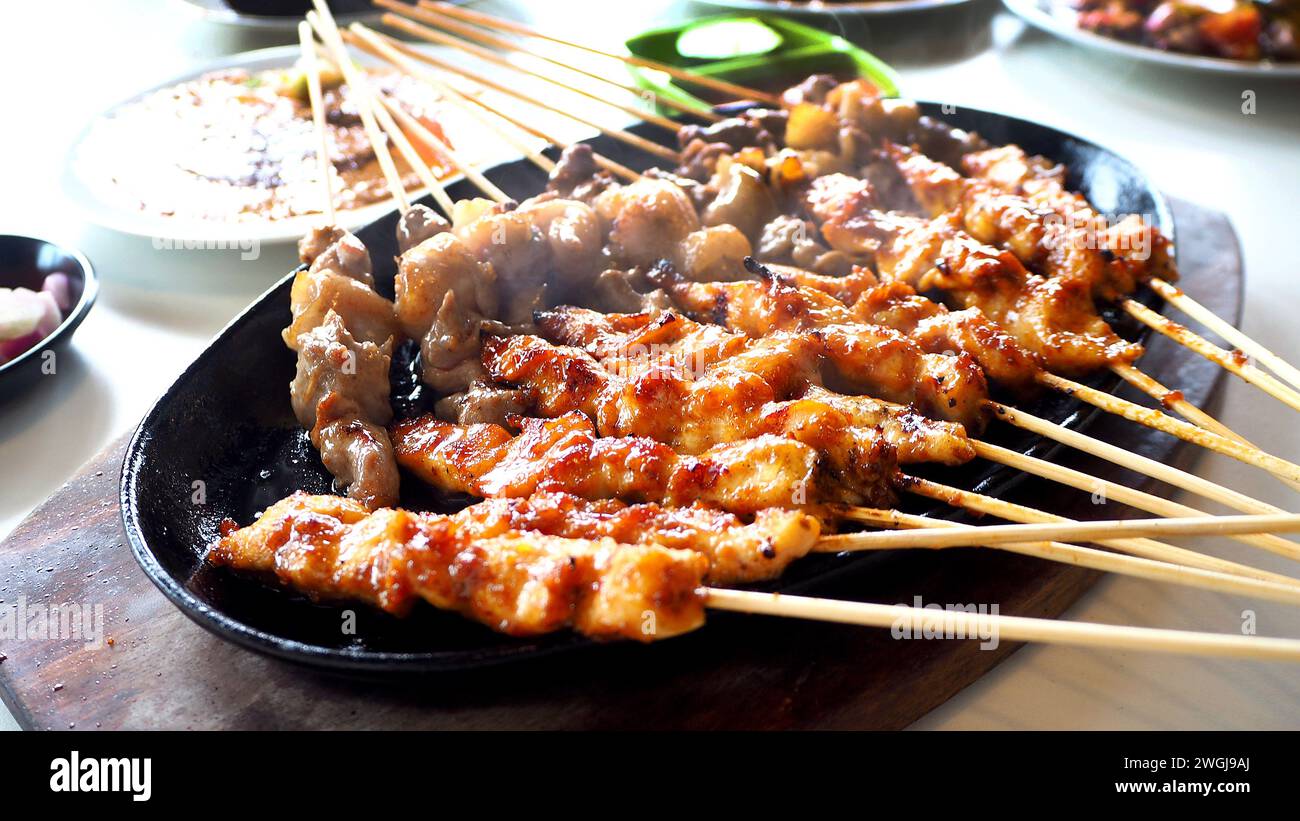 Delicious culinary Indonesian Food, chicken satay and goat satay in the ...
