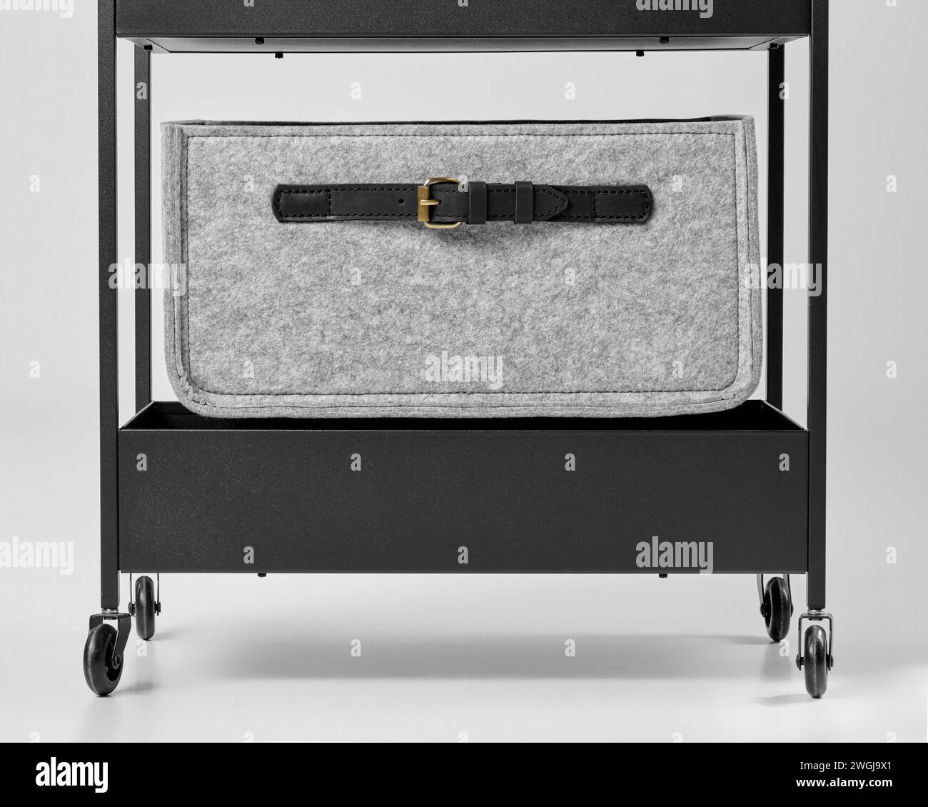 Grey felt storage drawer placed on metal office trolley Stock Photo - Alamy