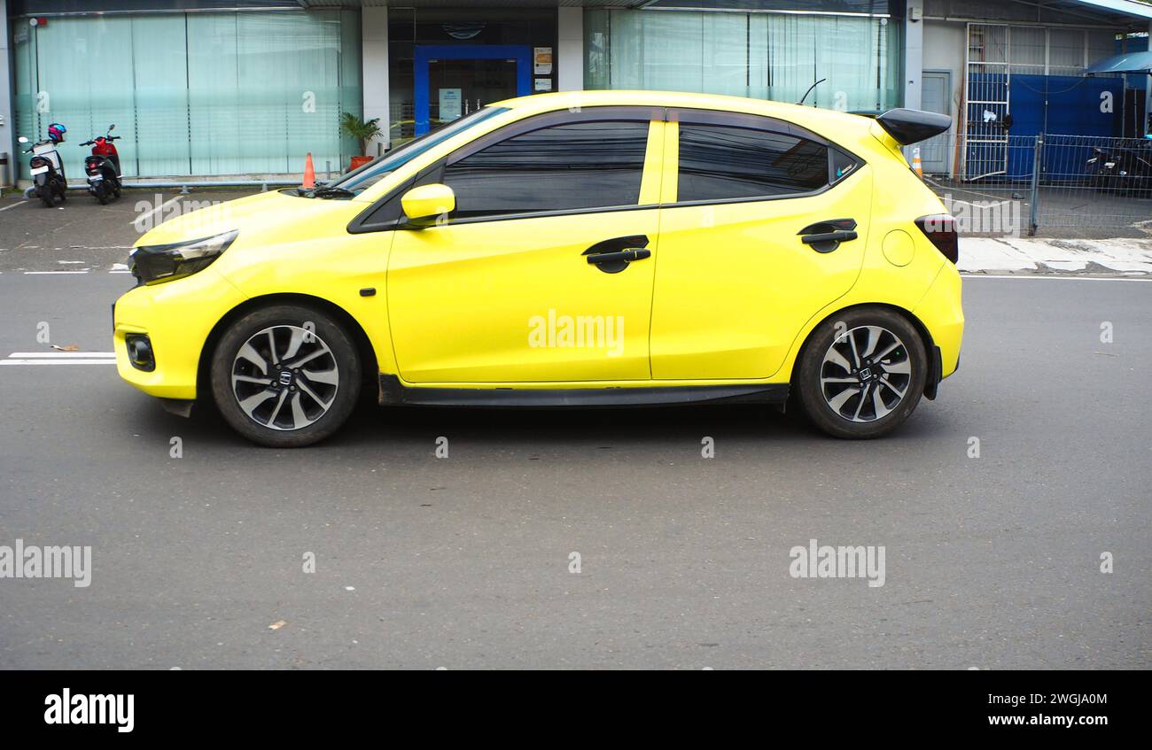 Honda Brio car, driving in commercial area, Radio Dalam Street, Jakarta ...