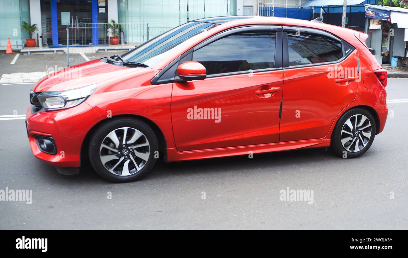 Honda Brio car, driving in commercial area, Radio Dalam Street, Jakarta ...