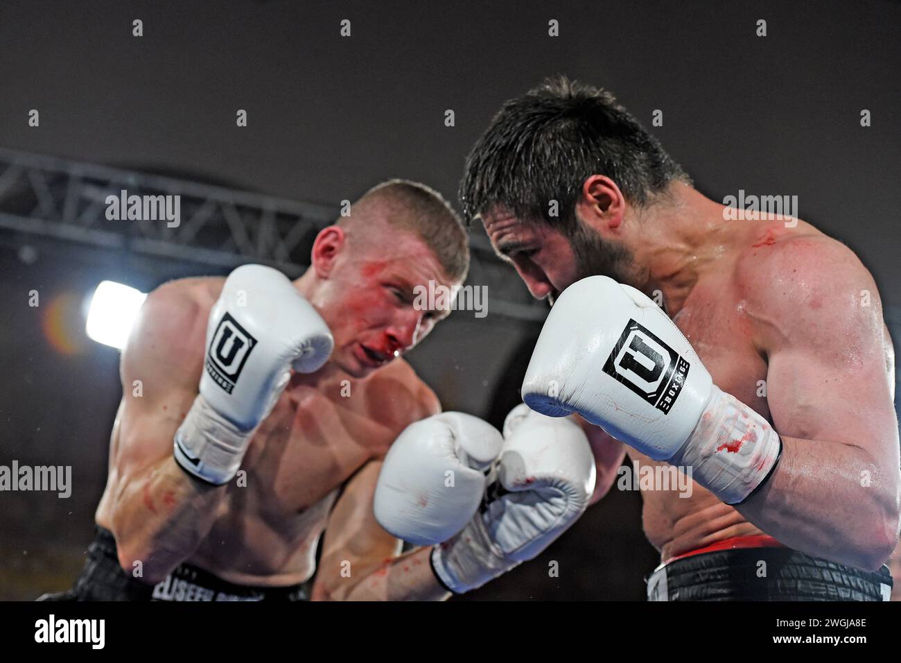 An unidentified boxers in the ring during fight for ranking points ...
