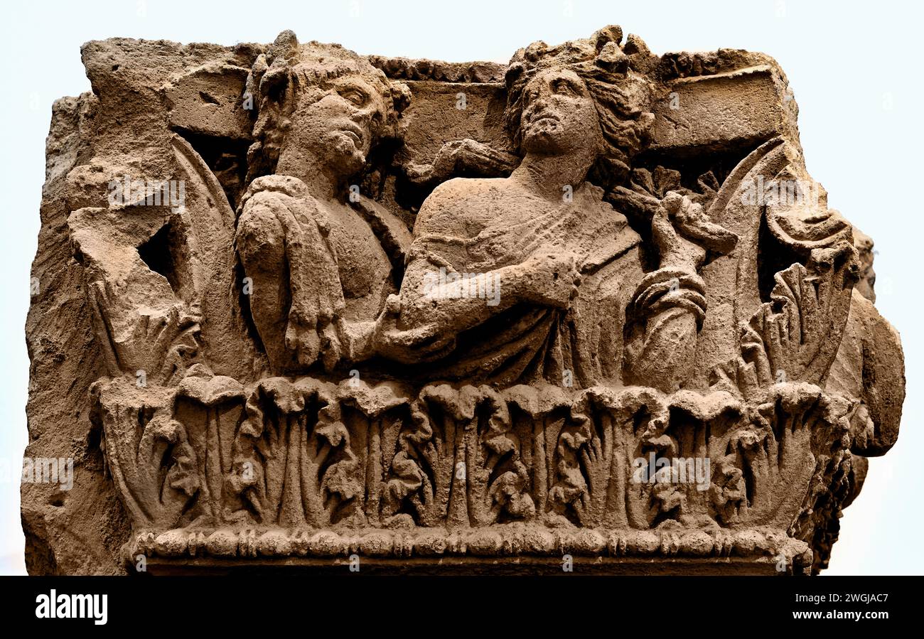 Ornately carved Roman tufa stone capital from Pompeii depicting married ...