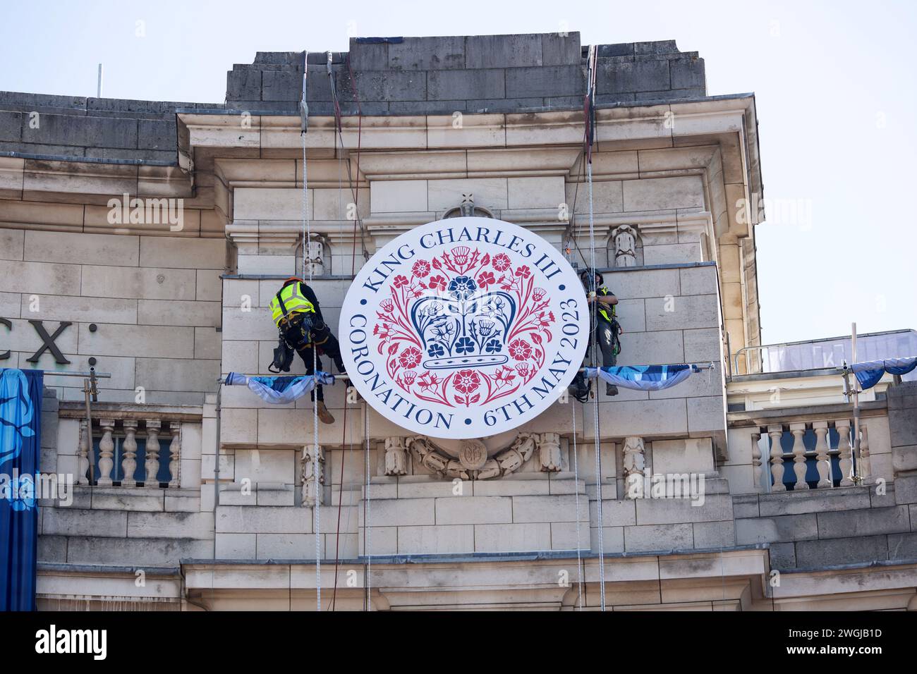The coronation emblem of King Charles III is installed on the Admiralty ...