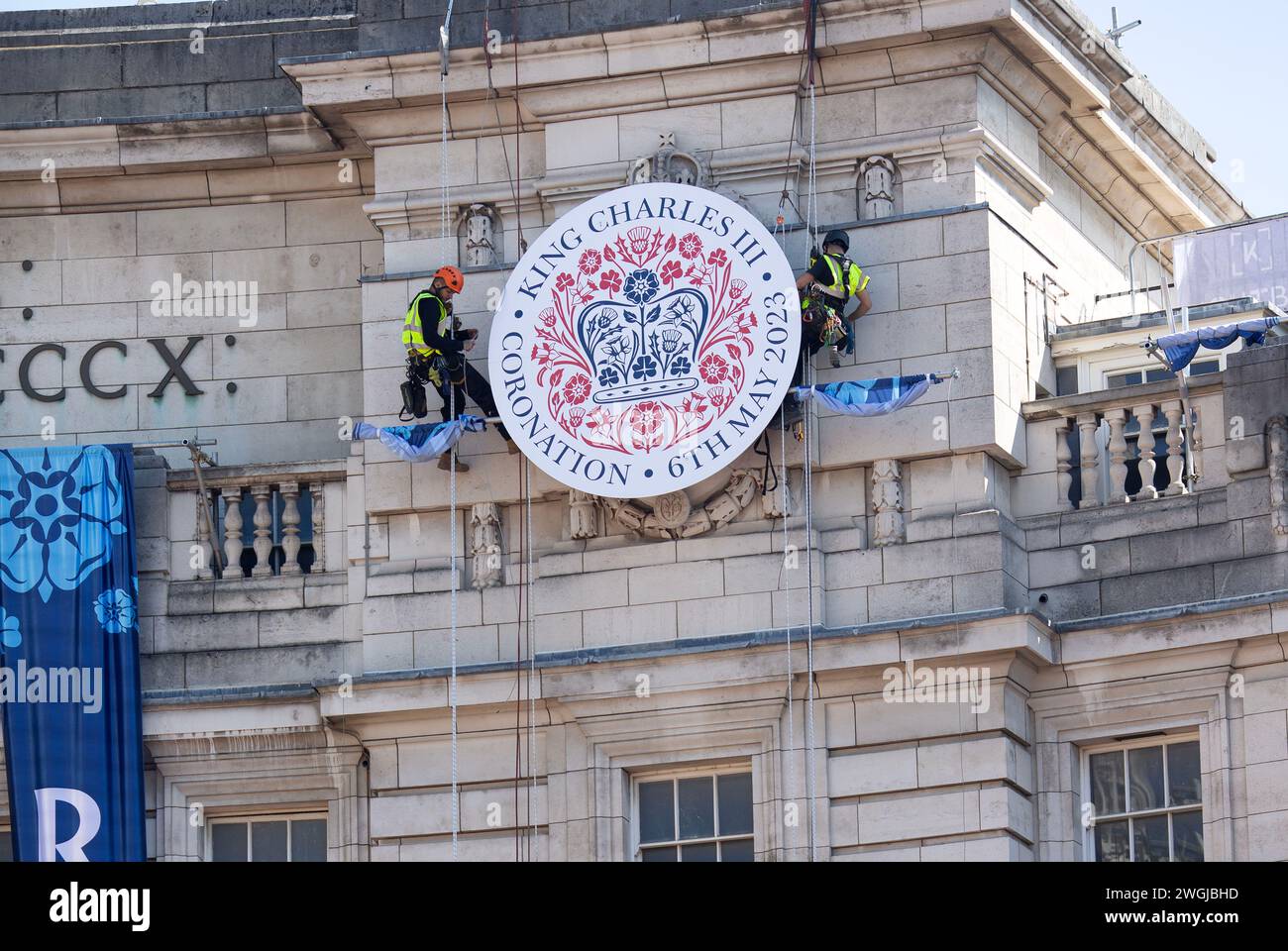 The coronation emblem of King Charles III is installed on the Admiralty ...