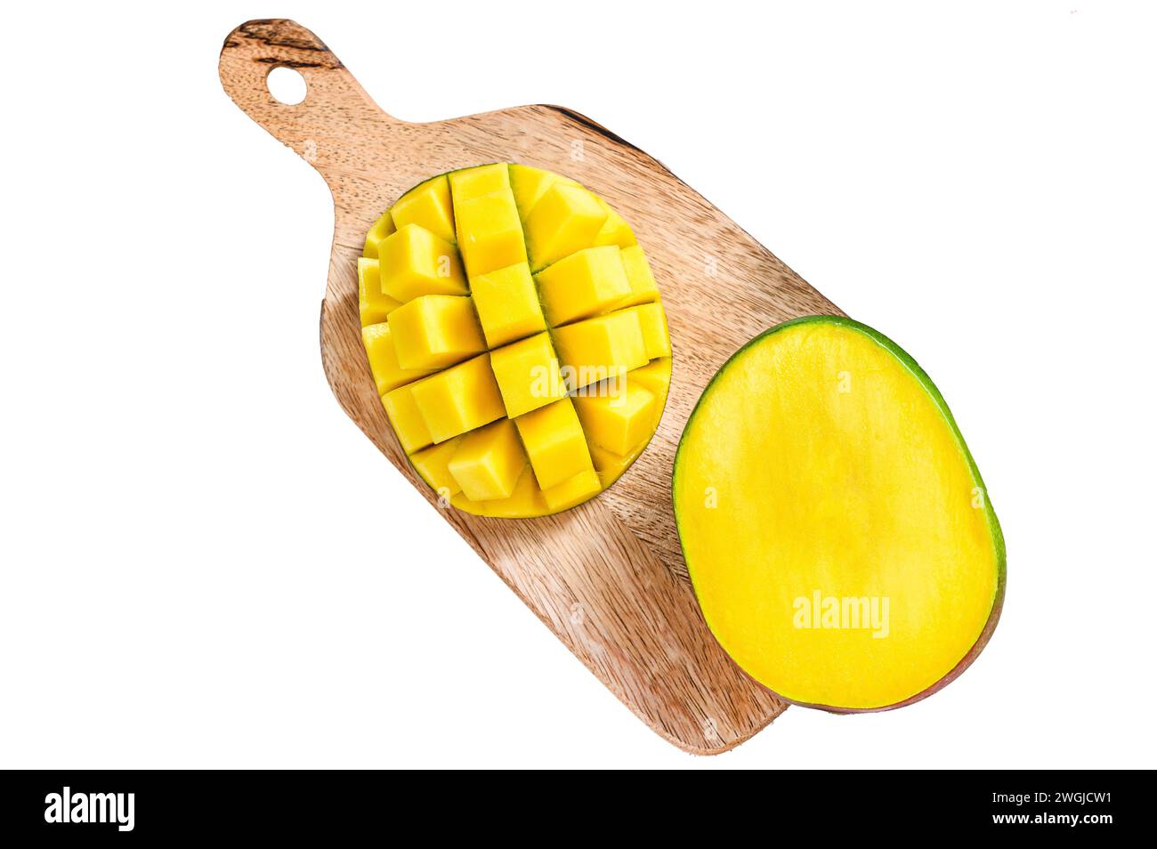 Mango fruit cut into cubes on a cutting Board. Isolated on white ...