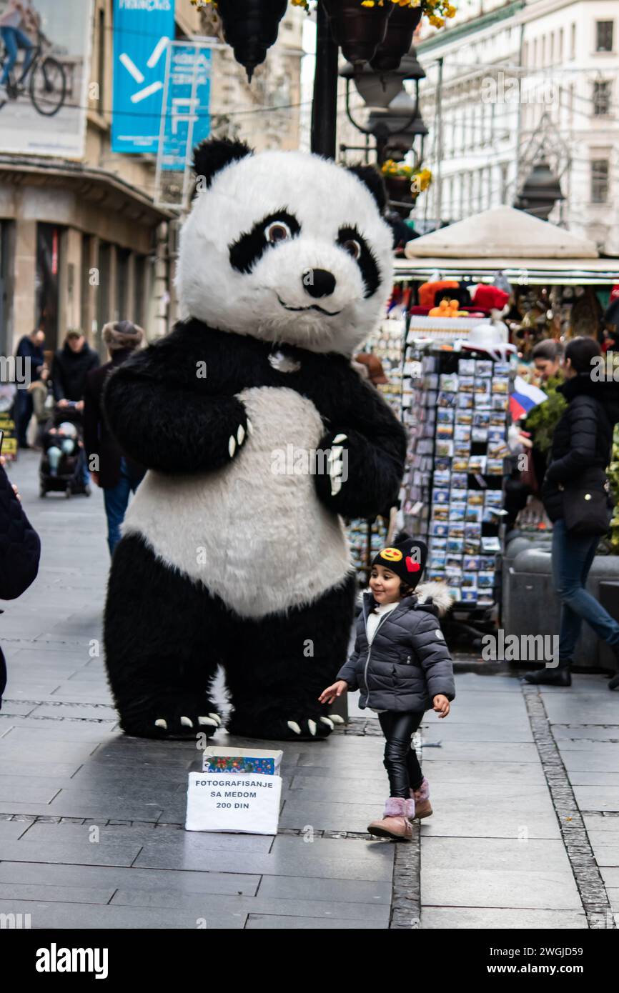 A giant Panda figure outside shops and Restaurants in main city ...