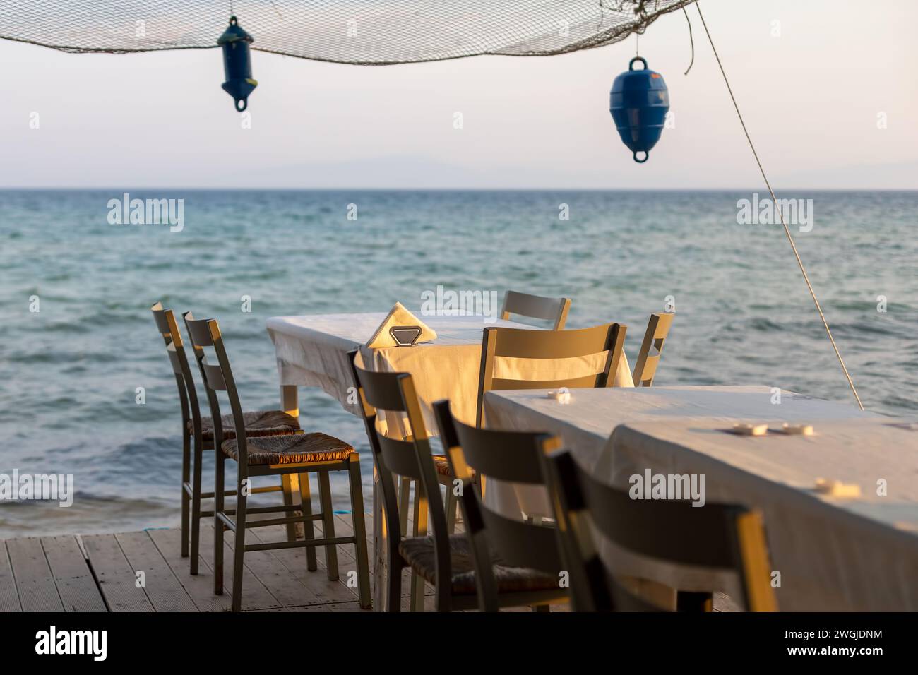 empty traditional seaside restaurant tables Stock Photo - Alamy