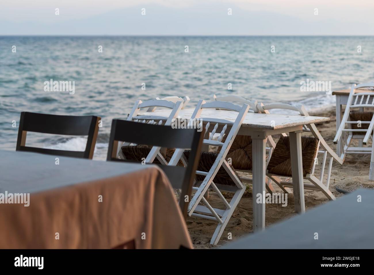 empty traditional seaside restaurant tables Stock Photo - Alamy