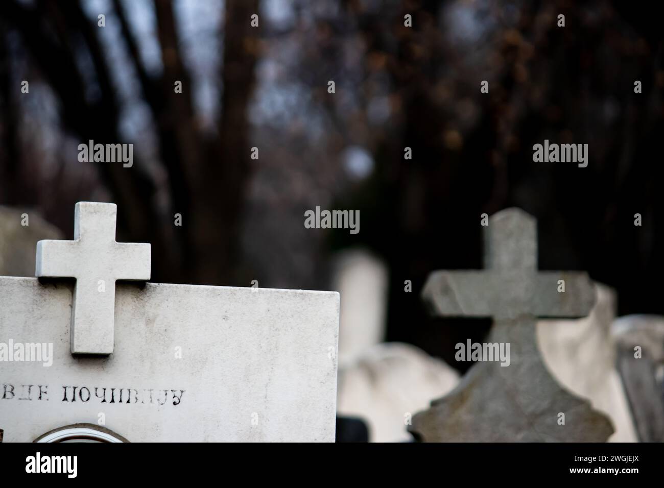 Marble and stone crosses at city graveyard, rest in peace to the dead ...