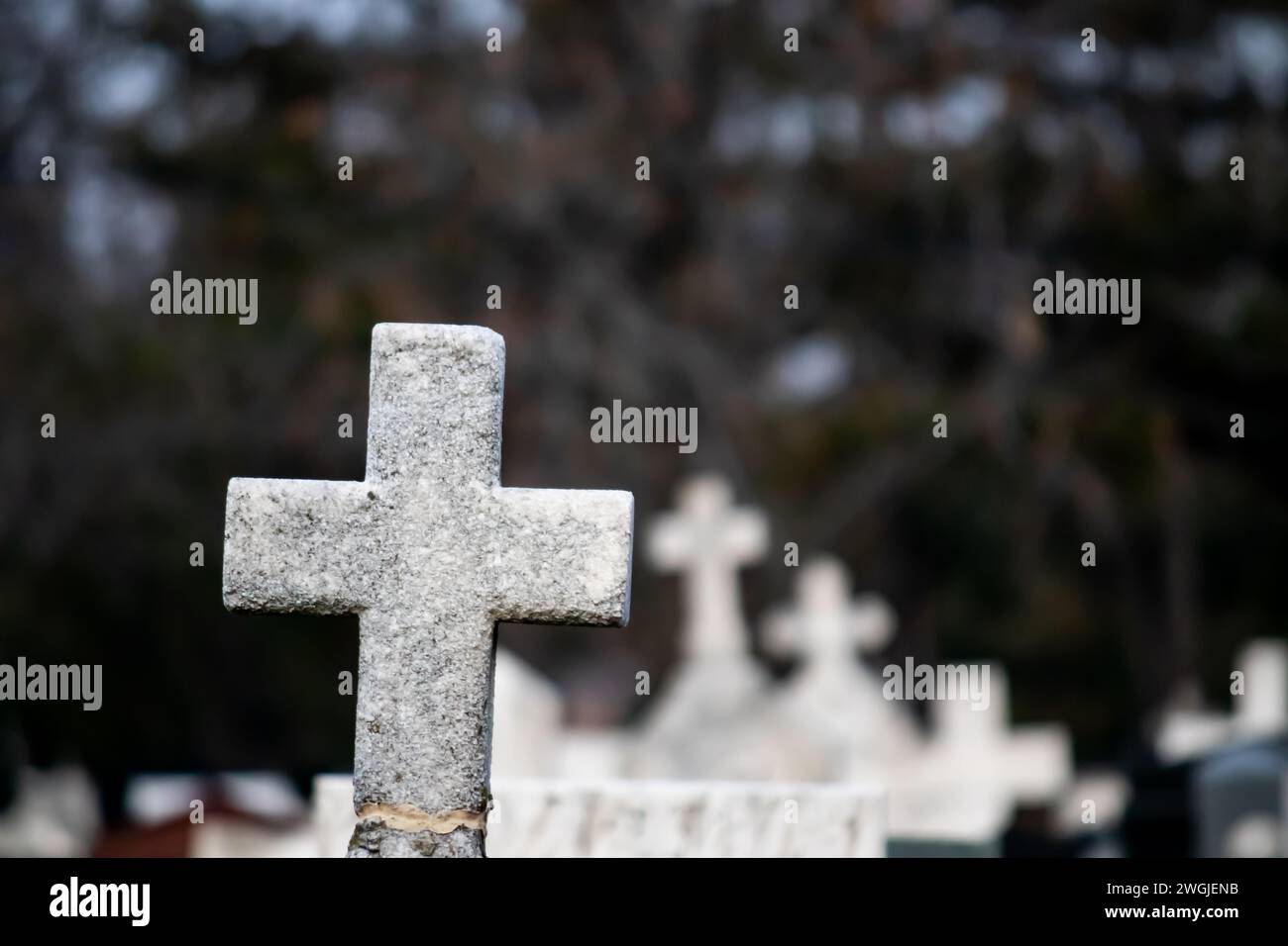 Marble and stone crosses at city graveyard, rest in peace to the dead ...