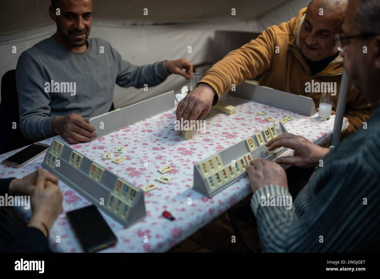 Ankara, Turkey. 05th Feb, 2024. The Erkek family board game "okey ...