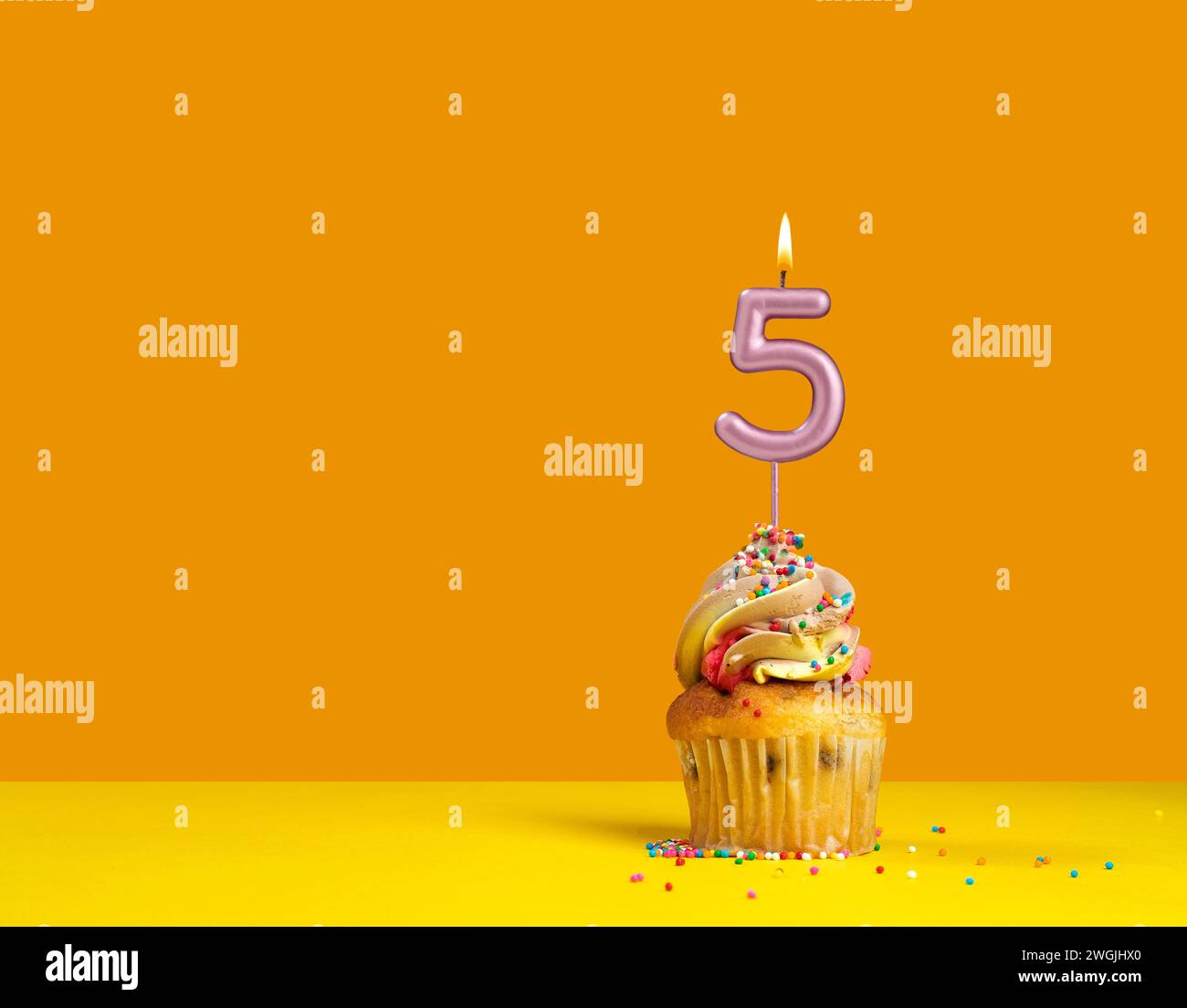 Birthday celebration with cupcake - Candle number 5 Stock Photo - Alamy