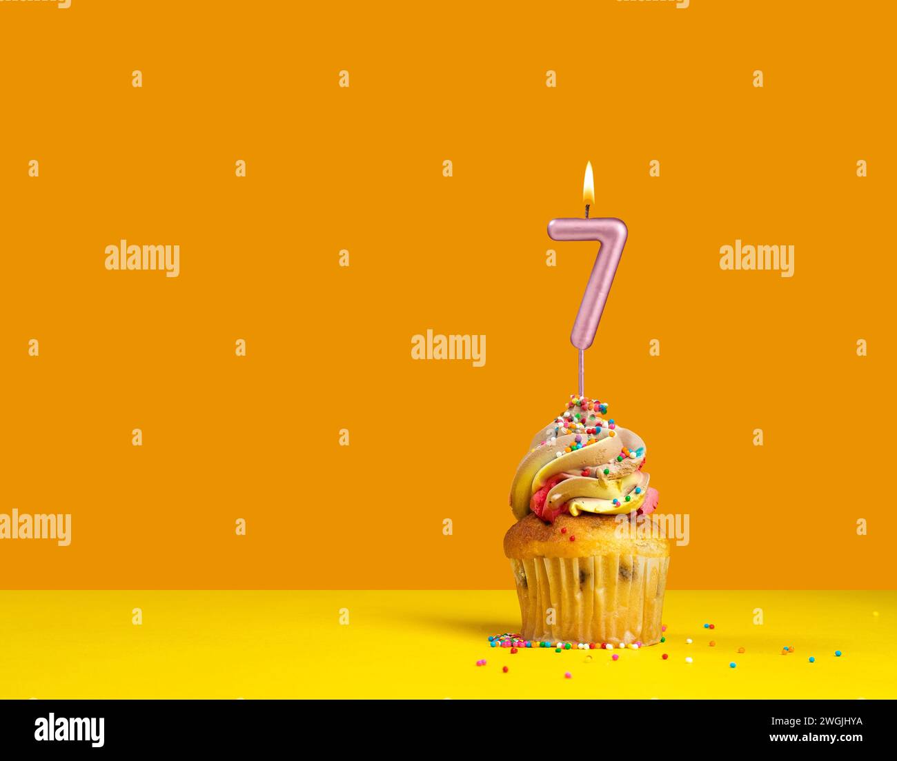 Birthday celebration with cupcake - Candle number 7 Stock Photo - Alamy