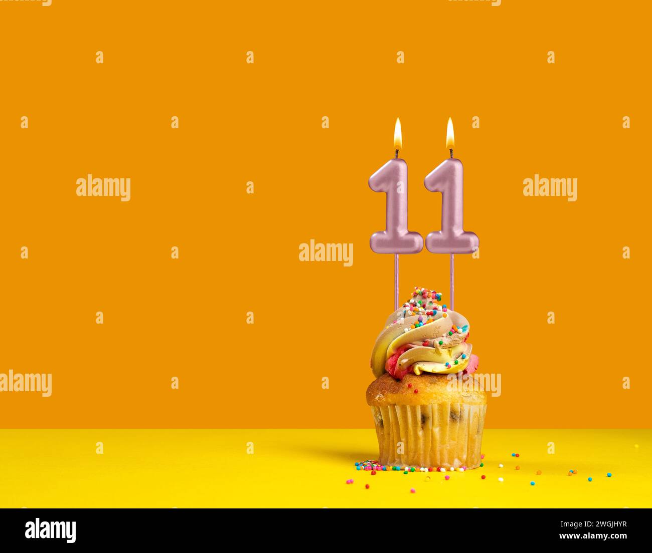 Birthday celebration with cupcake - Candle number 11 Stock Photo - Alamy