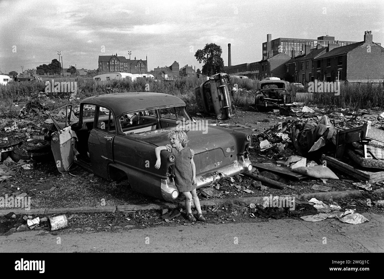 Gypsy Irish travellers encampment and temporary scrap car dump on waste ...