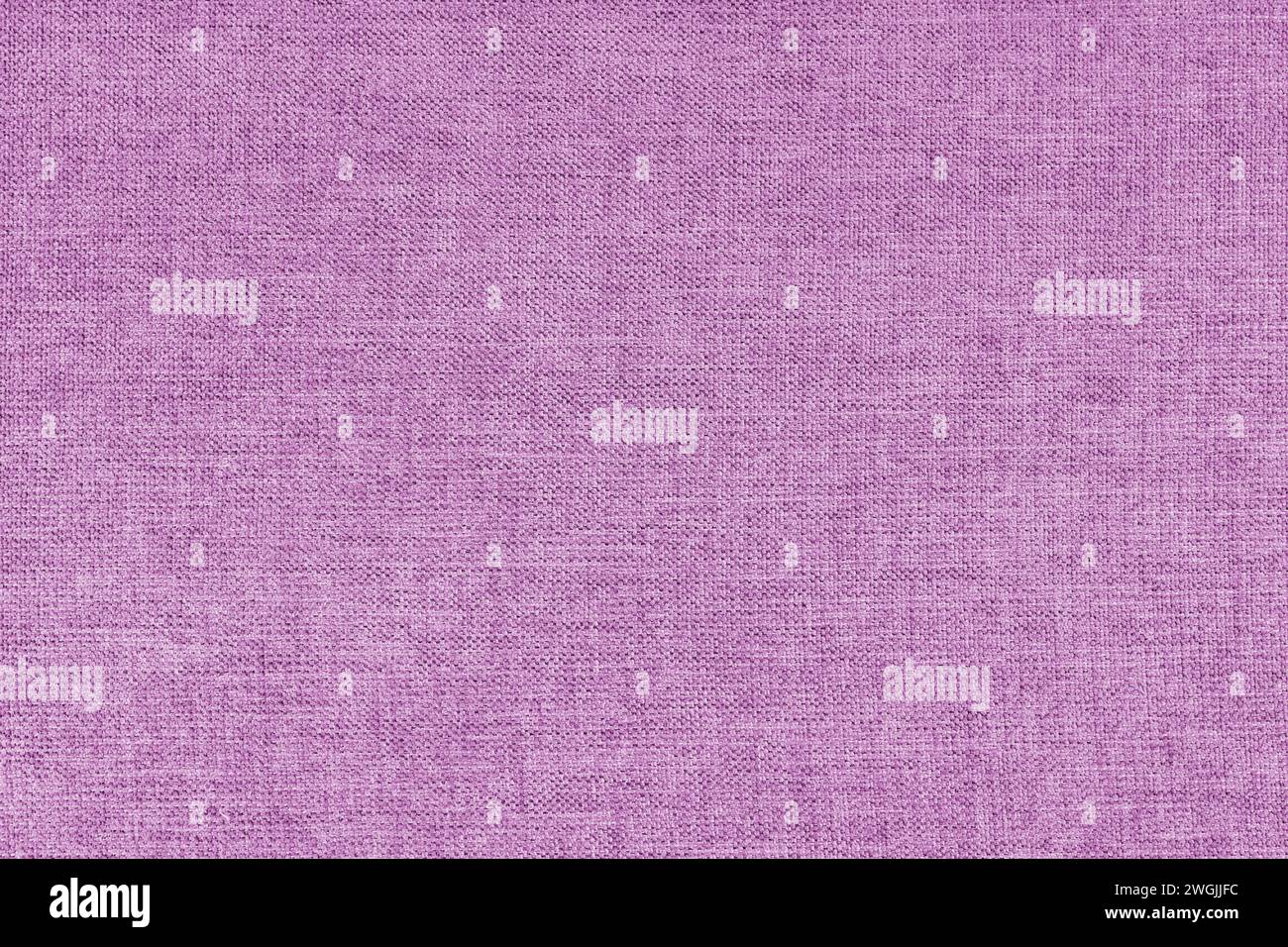 Textile background, pink coarse fabric texture, cloth structure close ...