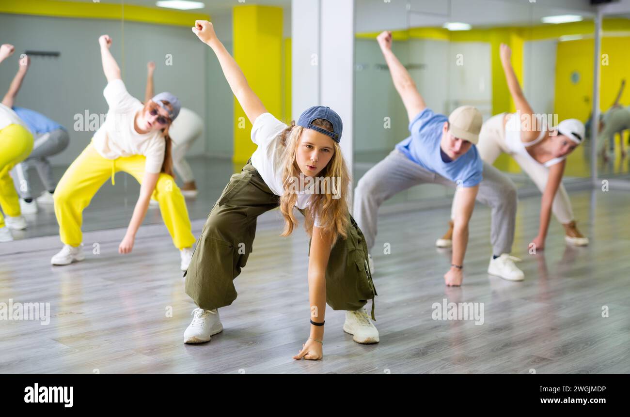 Dancer boys and girls showing different tricks and movements while ...