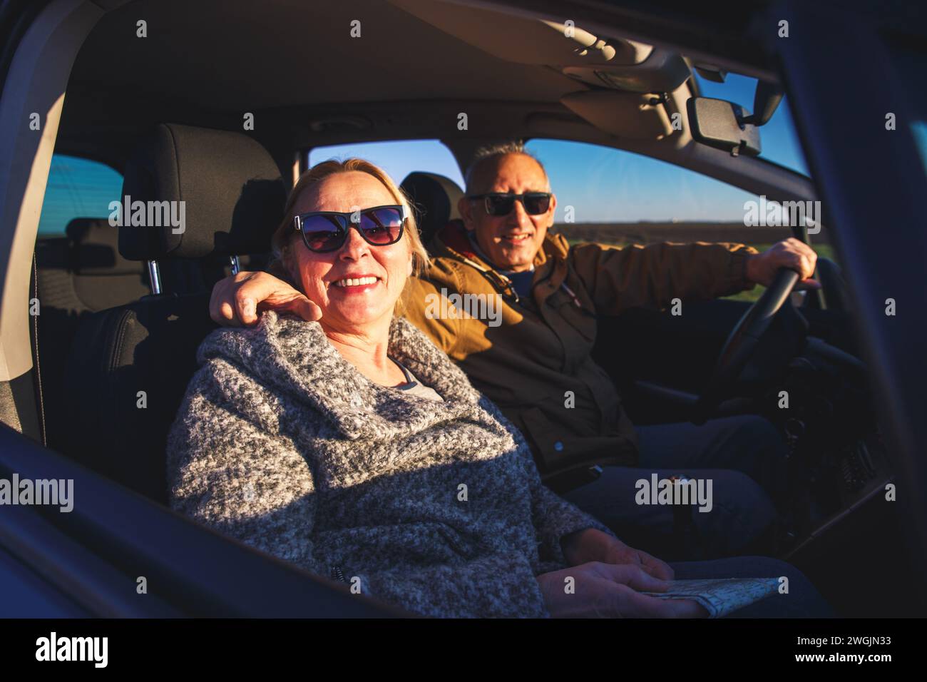 Husband and wife driving hi-res stock photography and images - Alamy