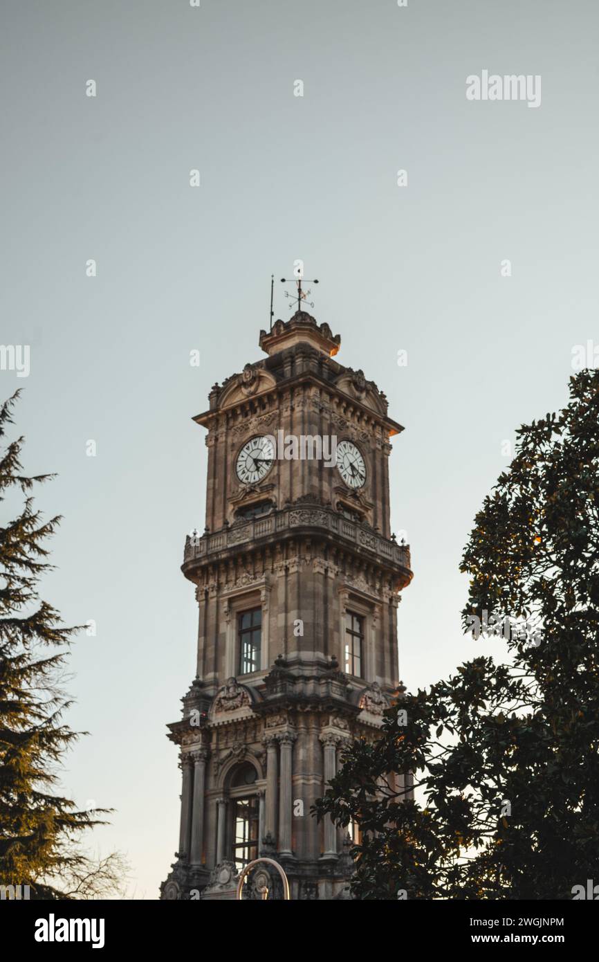 An antique clock tower featuring dual clocks at its center in Istanbul ...