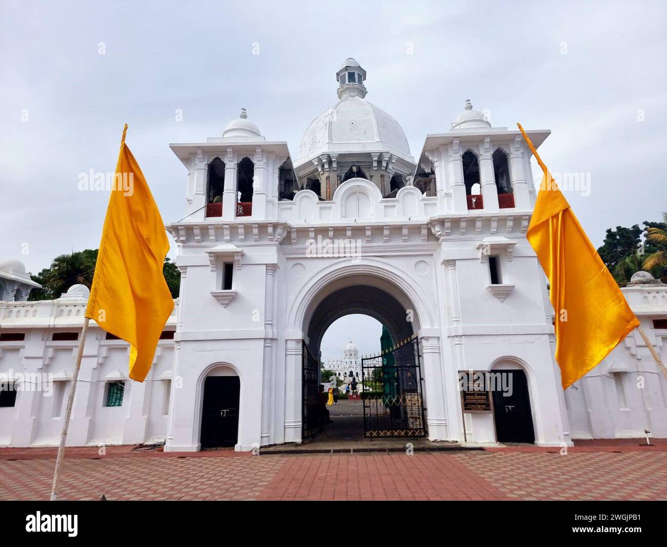 Flags decorate the entrance of the State Museum in Agartala. Tripura ...