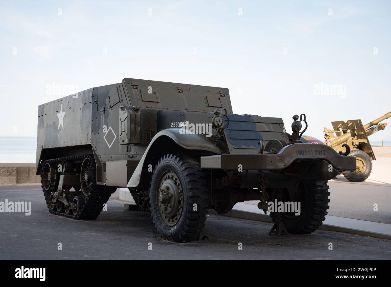 An old American M3 half track armored military vehicle on the street of ...
