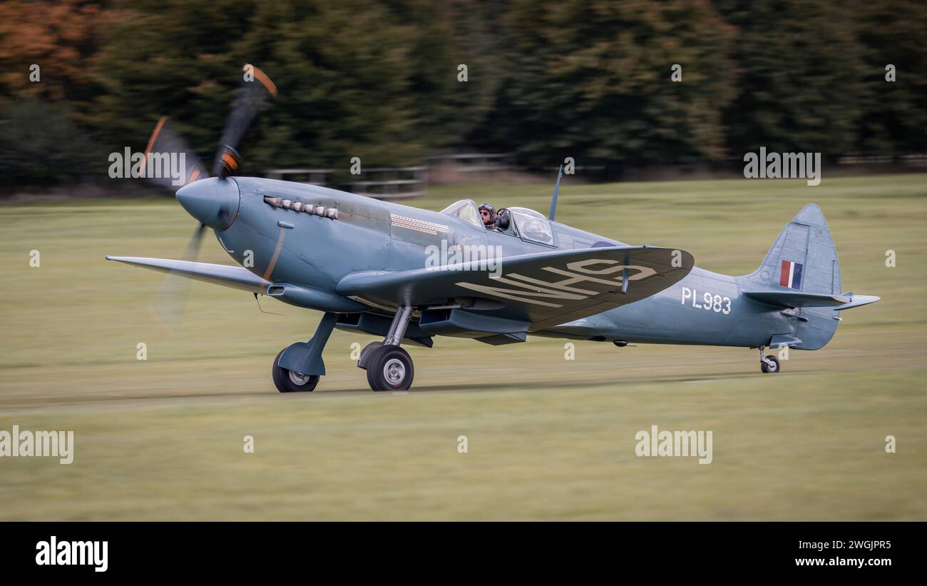 Old Warden,UK - 2nd October 2022: A British World War 2 Spitfire fighter aircraft, landing on a ...