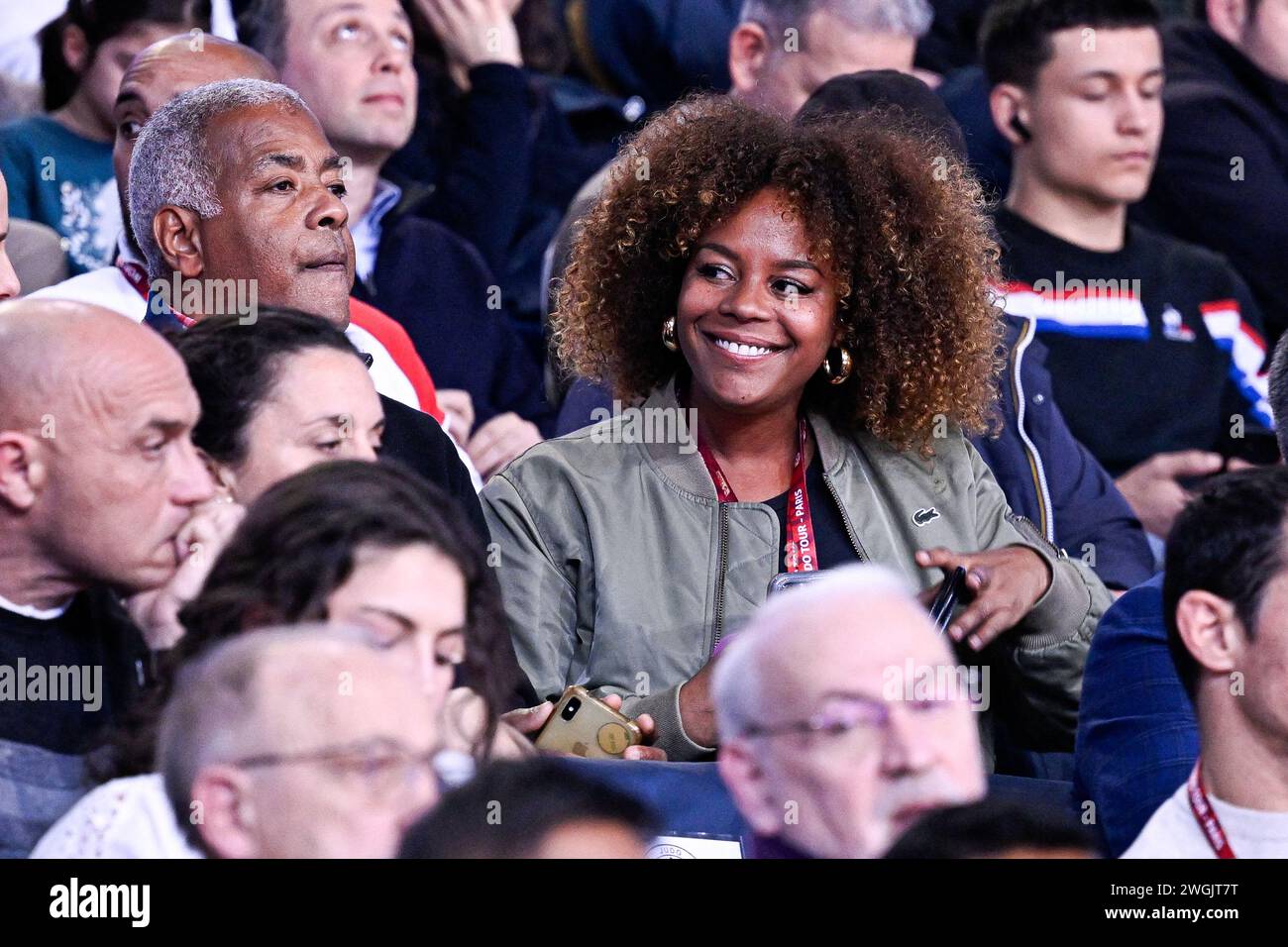 Luthna Plocus wife of Teddy Riner and his father Moise during the Paris ...